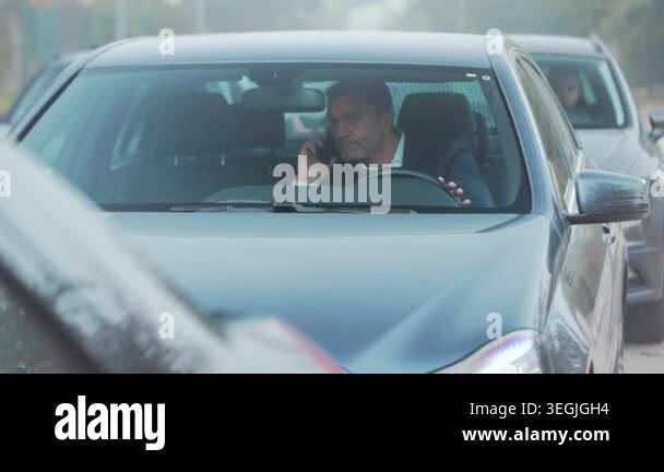 rideshare driver negotiating deal in traffic, calm demeanor using ...