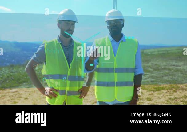 white and black engineers inspect wind farm using augmented reality ...