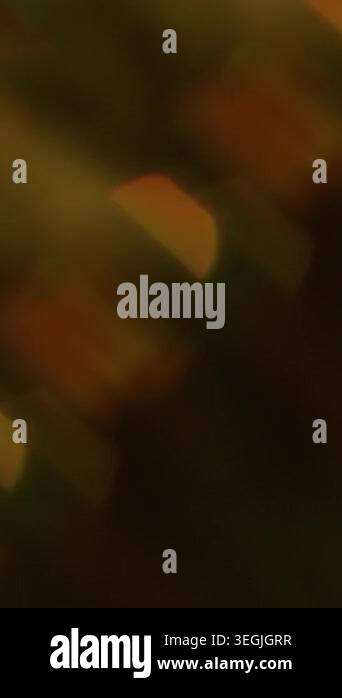 Vertical video. Defocused shimmering flare. Gradient light. Colorful ...