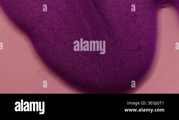 Purple paint spill. Shimmer fluid. Defocused pink color chemical bubble ...