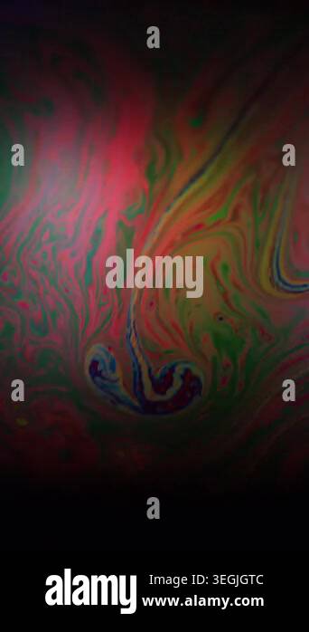 Vertical video. Blur color fluid. Paint water. Pink purple green neon ...