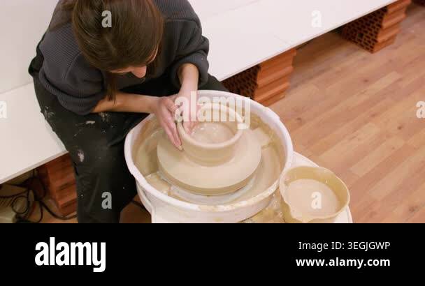 Handcraft therapy. Ceramic crockery. Professional female artisan ...