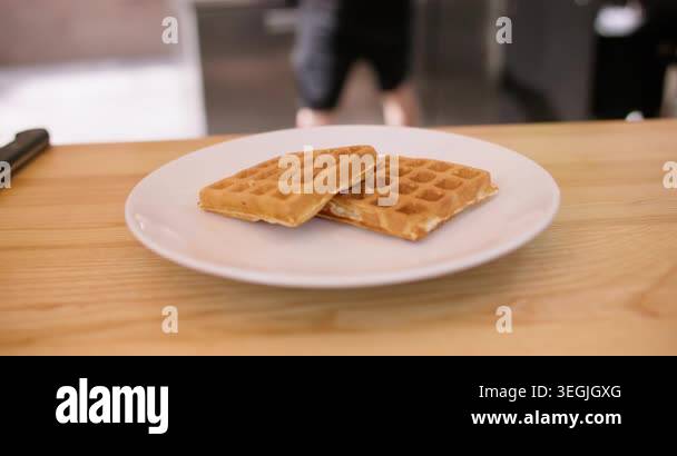 Waffle serving. Sauce adding. Unrecognizable chef hands in gloves ...