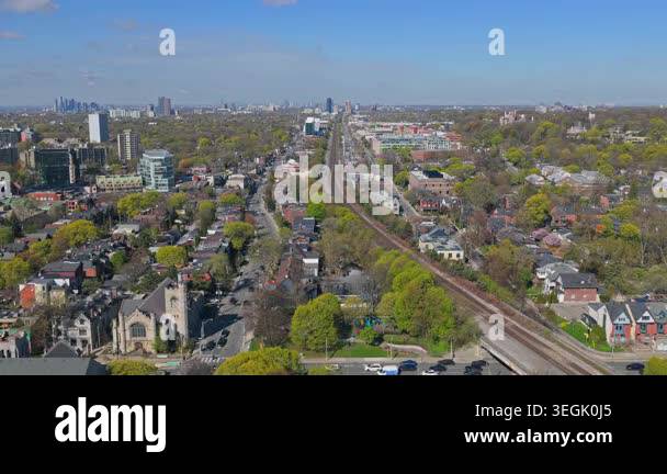 Urban landscape showing Toronto skyline, Church of the Messiah in Annex ...