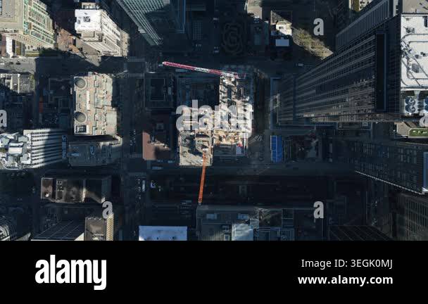 Aerial perspective revealing a modern skyscraper under construction ...
