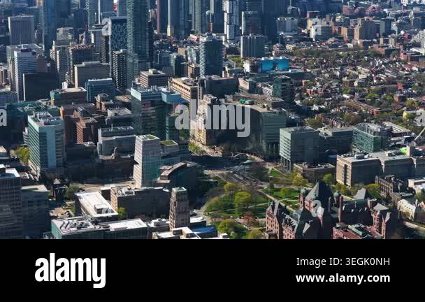Urban landscape flying above Torontos modern skyscrapers and historic ...