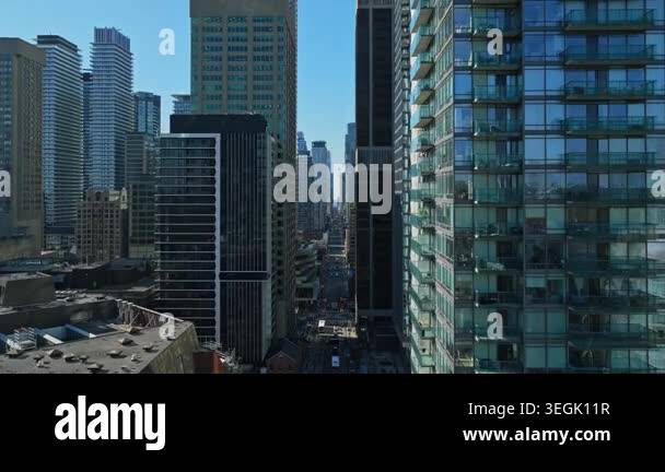 Urban canyon perspective of Toronto downtown with high rise apartment ...