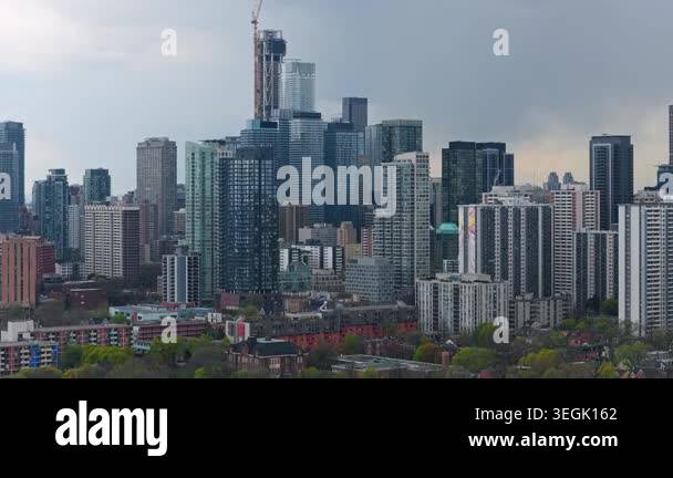 Overcast skies above downtown Torontos impressive cityscape and skyline ...