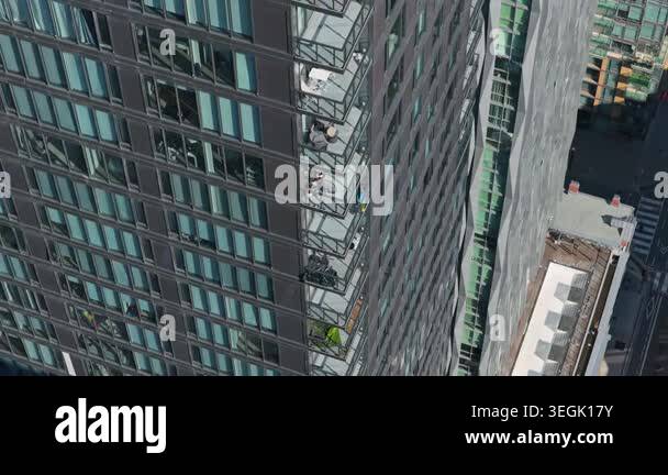 Soaring skyscraper revealing modern architecture with glass windows and ...