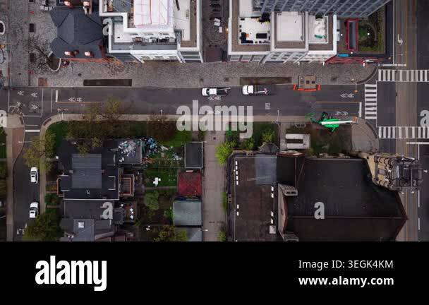 Top down flight over downtown area revealing modern buildings, urban ...