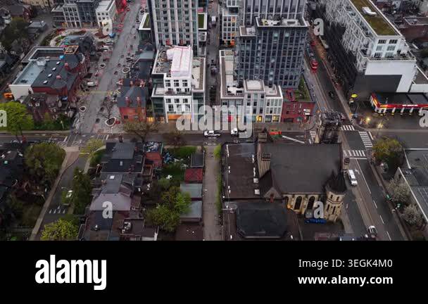 High angle urban cityscape showing downtown traffic moving through city ...