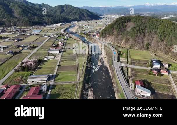 Aerial view of river and green fields Stock Video Footage - Alamy