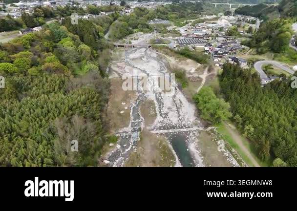 Aerial view of riverbed and surrounding greenery Stock Video Footage ...