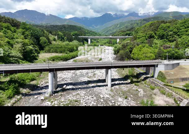 Aerial view of bridges over rocky riverbed Stock Video Footage - Alamy