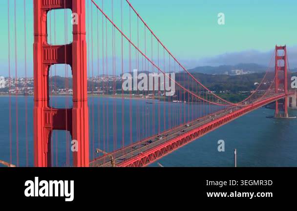 Panoramic aerial style view of the iconic red bridge with traffic and ...