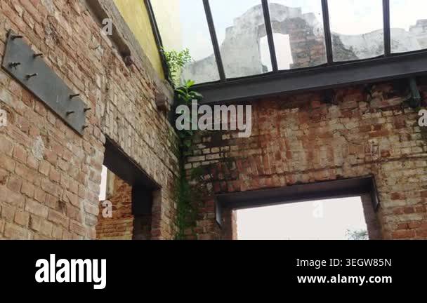 Exploration of an old brick building interior, showing architectural ...