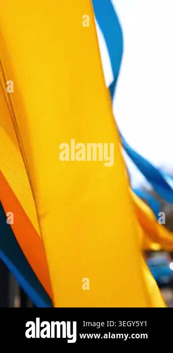New York, USA, 15 April 2026: Close-up Ukrainian color ribbons on iron ...