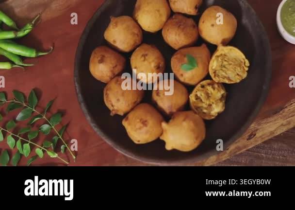 Chicken Balls stuffed and fried to a crispy finish served with green ...