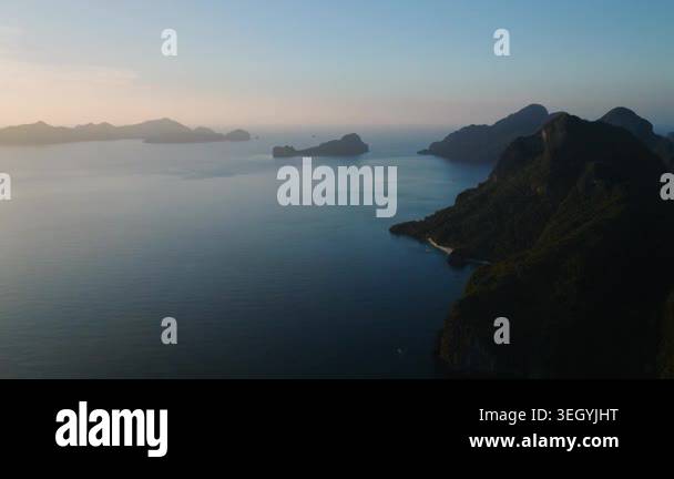 Sunset over Helicopter Island in El Nido. Tropical Islands at dusk time ...