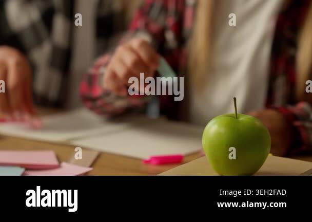 Close up family little girl child mother hands learning together doing ...