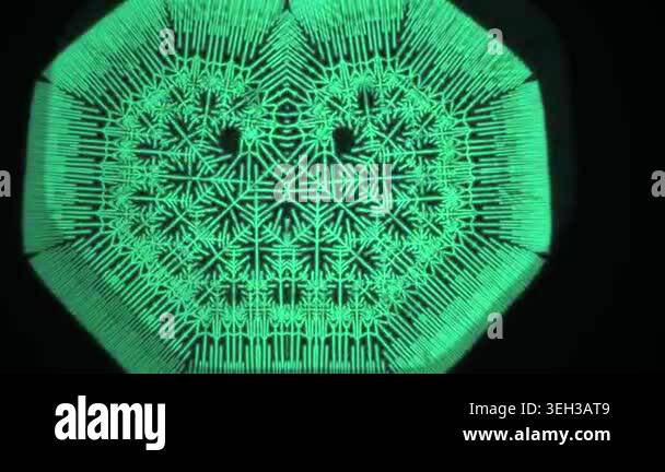 Glowing green and orange light designs Stock Video Footage - Alamy
