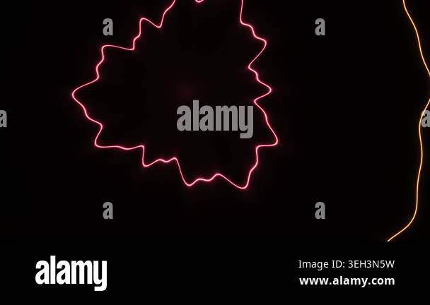Neon shapes glowing on dark Stock Video Footage - Alamy