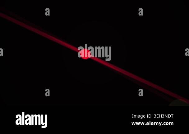 A red dot on a dark background Stock Video Footage - Alamy
