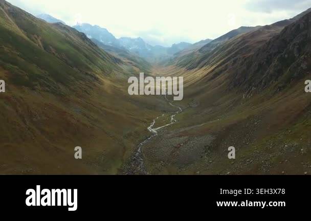 Aerial panorama U shaped glacial valleys in lower Himalaya, rocky ...