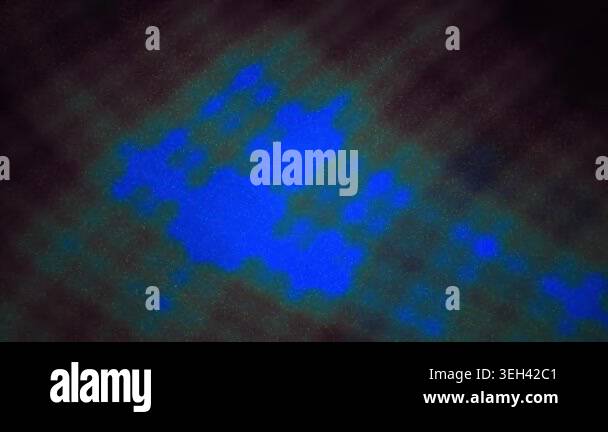 Glowing blue light on a dark background Stock Video Footage - Alamy