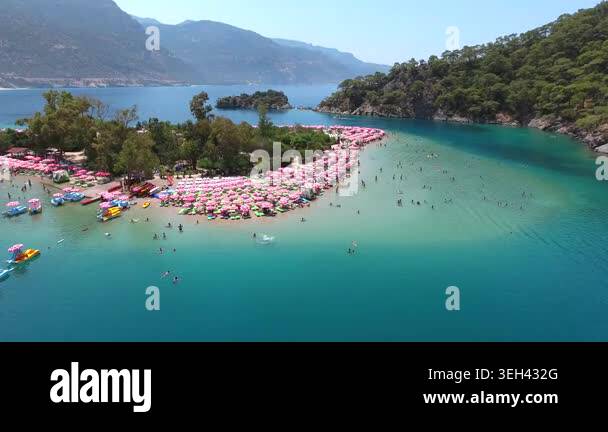 Aerial view of tropical summer beach vacation with shallow lagoon bay ...