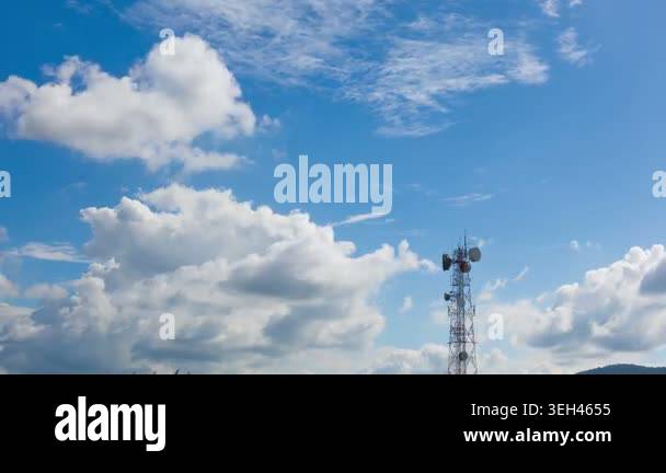 Beautiful white clouds on blue sky background with communication tower ...