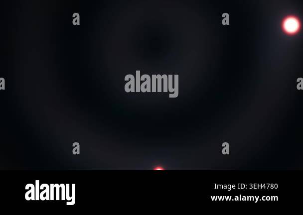 Glowing red light on dark background Stock Video Footage - Alamy