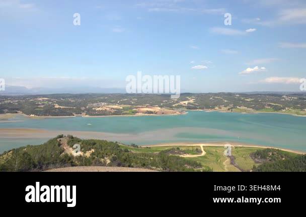 Descending lake basin reveals sandy littoral drift caused by drought ...