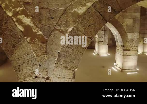 Stone arches and columns line Sultanhani Caravanserai interior in ...
