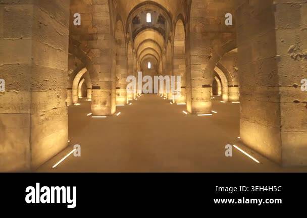 Stone arches and columns line Sultanhani Caravanserai interior in ...