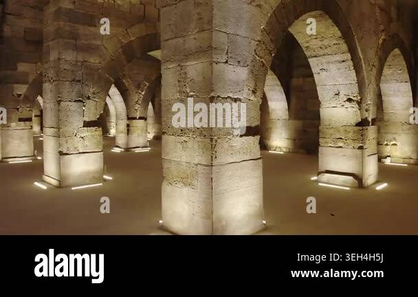 Stone arches and columns line Sultanhani Caravanserai interior in ...