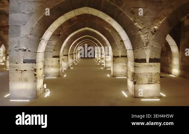 Stone arches and columns line Sultanhani Caravanserai interior in ...