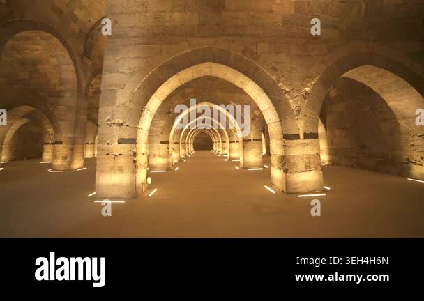 Stone arches and columns line Sultanhani Caravanserai interior in ...