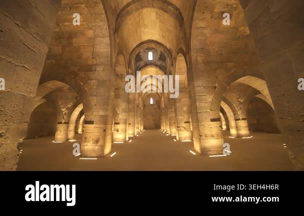 Stone arches and columns line Sultanhani Caravanserai interior in ...