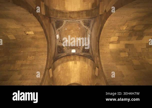 Stone arches and columns line Sultanhani Caravanserai interior in ...