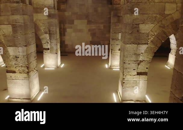 Stone arches and columns line Sultanhani Caravanserai interior in ...