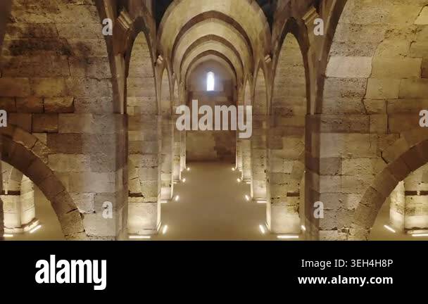 Stone arches and columns line Sultanhani Caravanserai interior in ...