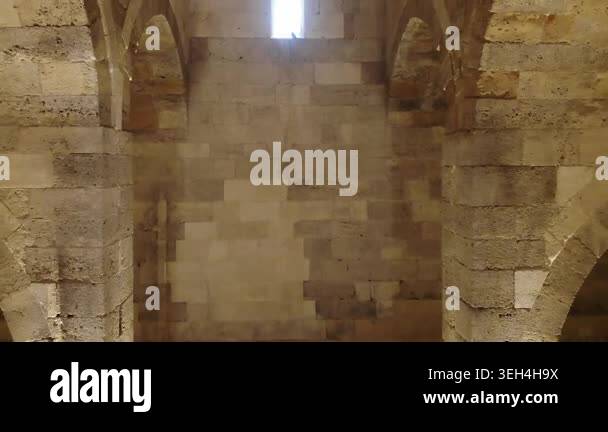 Stone arches and columns line Sultanhani Caravanserai interior in ...