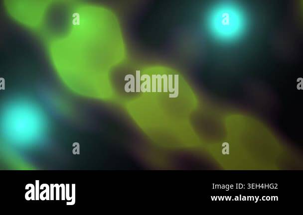 Glowing cells under microscope examination Stock Video Footage - Alamy