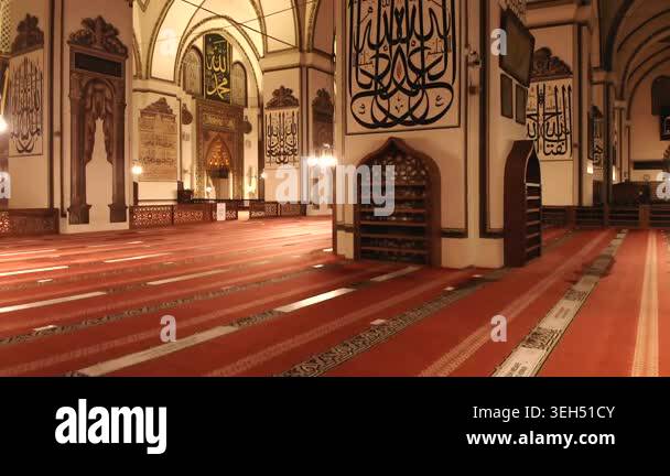 Interior of Bursa Ulu Mosque in Turkey with columns, Islamic art, and ...