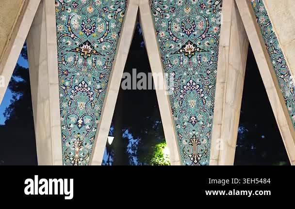 Omar Khayyam Mausoleum rises at night with geometric ornament and ...