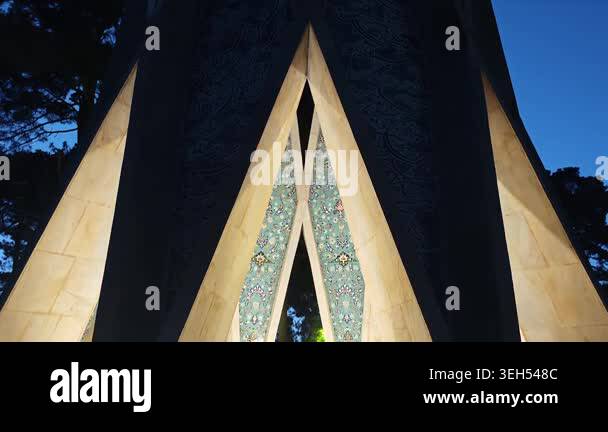 Omar Khayyam Mausoleum rises at night with geometric ornament and ...