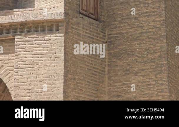 Historic wooden door detail on Tughrul Tower shows aged material and ...