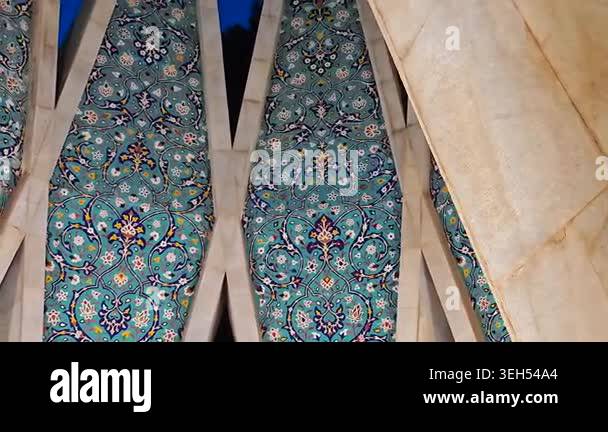 Omar Khayyam Mausoleum rises at night with geometric ornament and ...