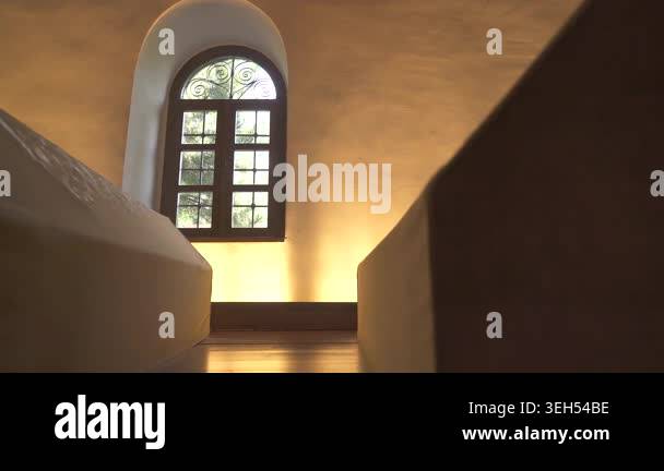 Cloth covered caskets rest inside Islamic tomb, sacred interior ...